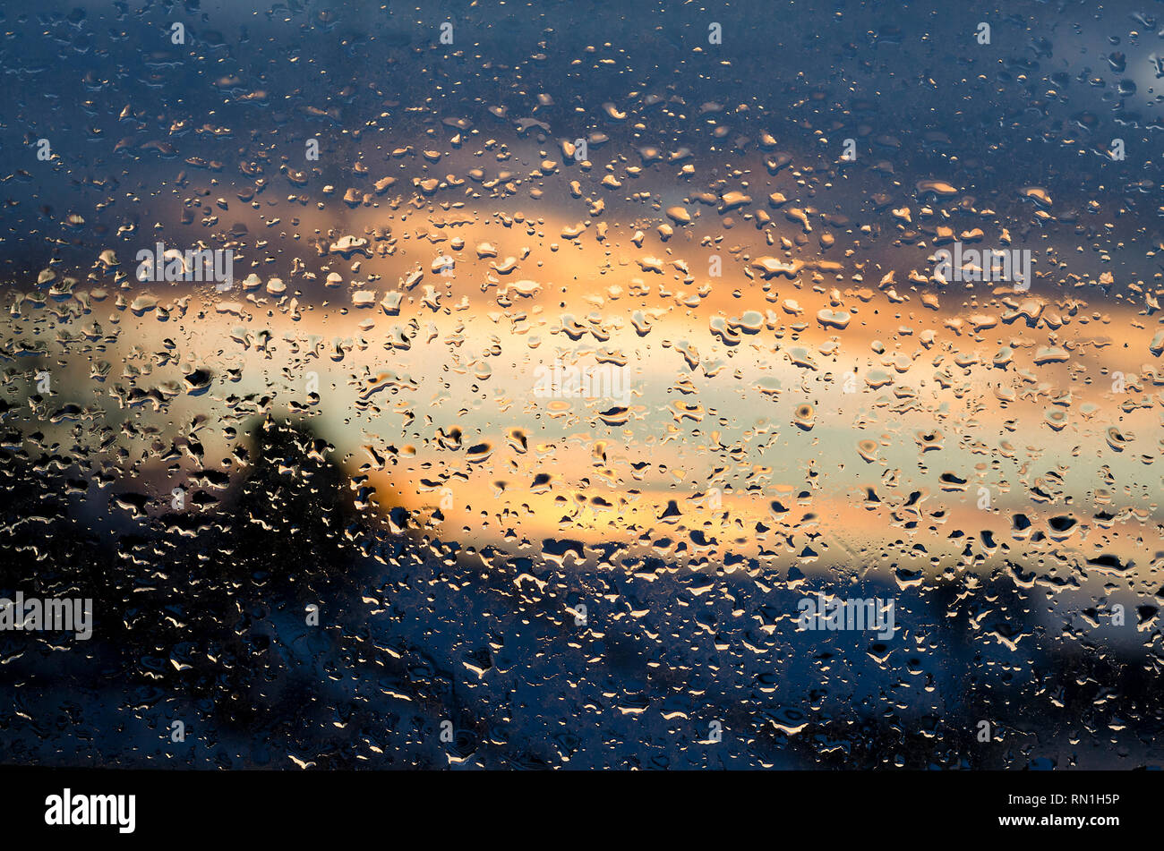 Raindrops on the window glass Stock Photo - Alamy
