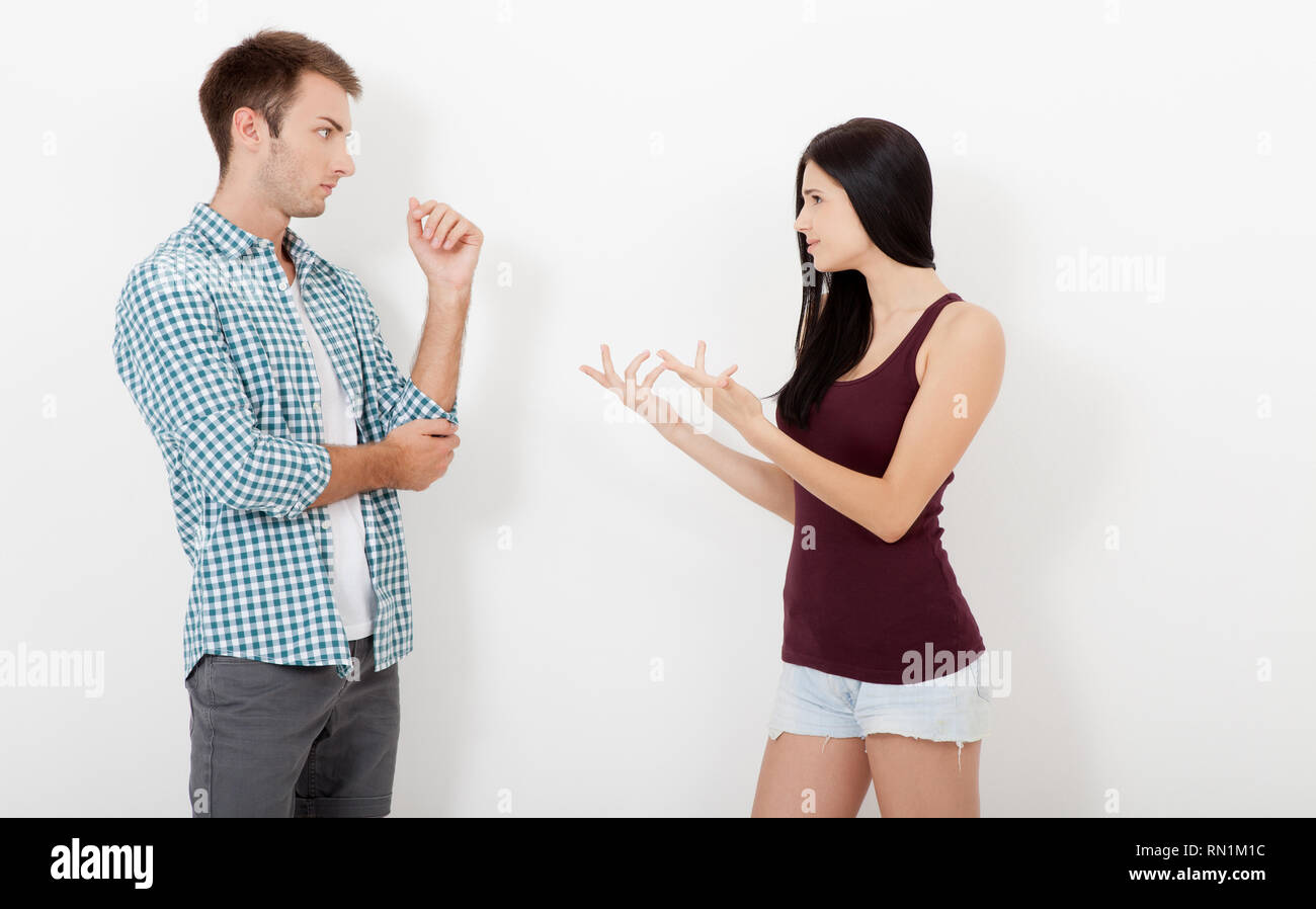 Couple talking arguing on each other isolated on white background Stock ...