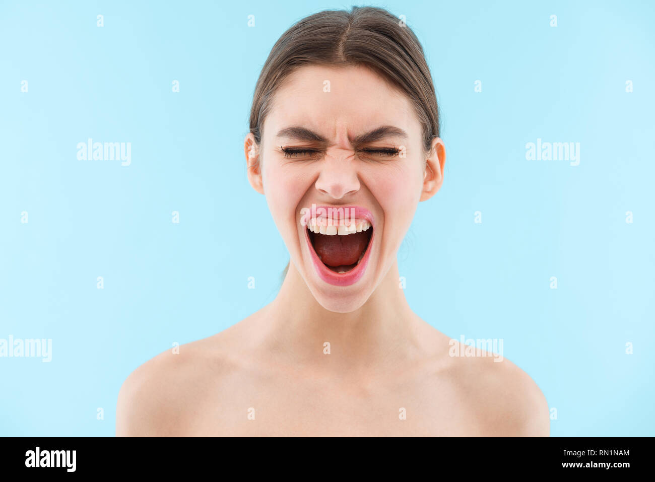 Image of beautiful emotinal screaming young woman posing isolated over ...