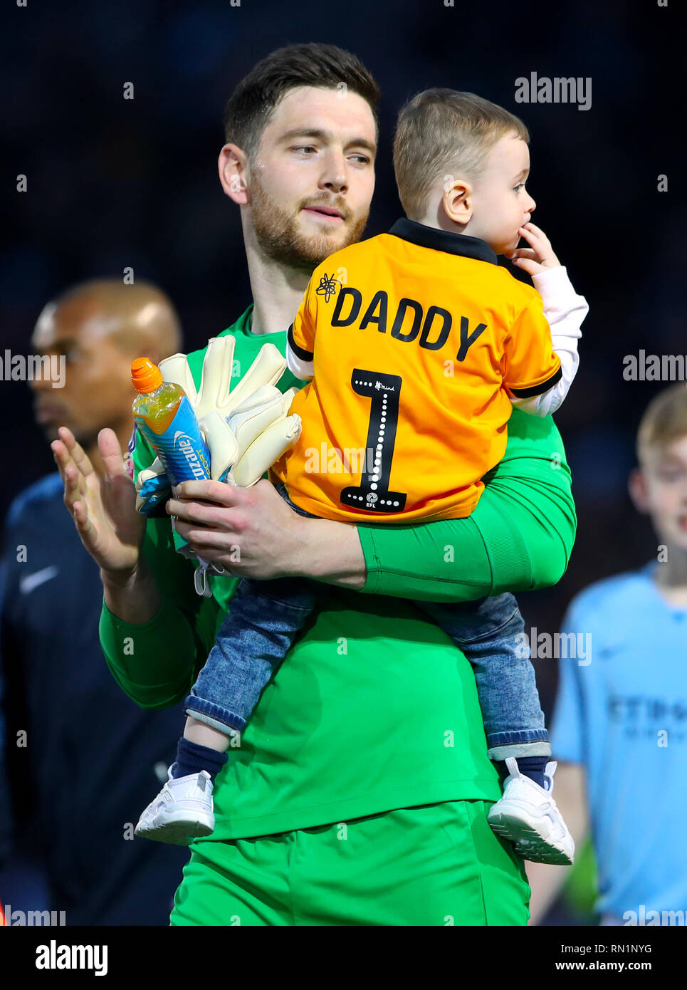 Newport County goalkeeper Joe Day and son during the FA Cup fifth round ...