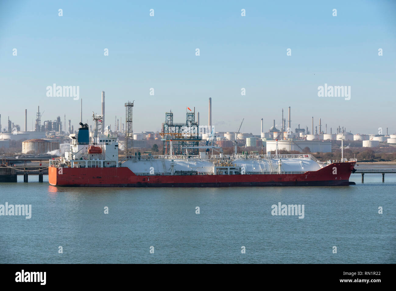 A liquid petroleum tanker vessel on a refinery berth Stock Photo - Alamy
