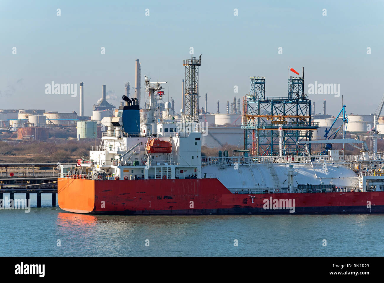A liquid petroleum tanker vessel on a refinery berth Stock Photo - Alamy