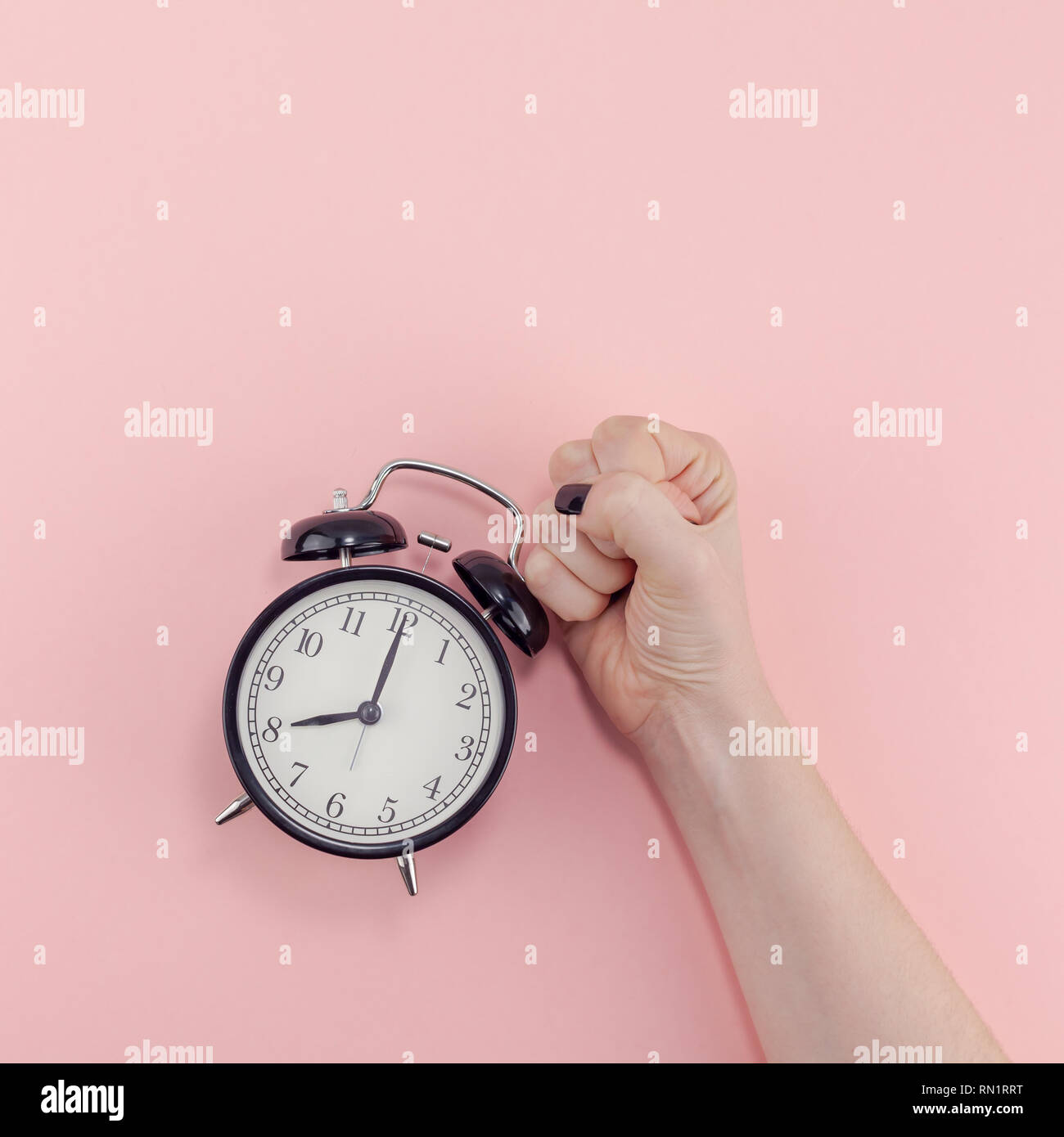 Creative flat lay morning time emotions concept top view of woman hand ...