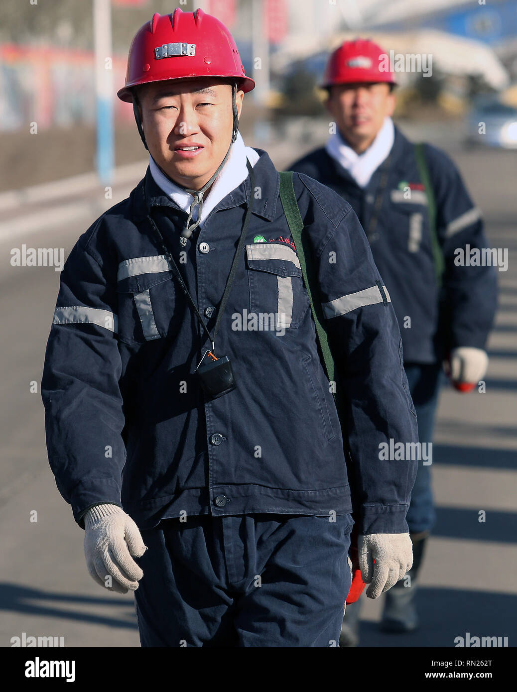 Datong, Shanxi, China. 12th Dec, 2018. Coal engineers walk to the ...