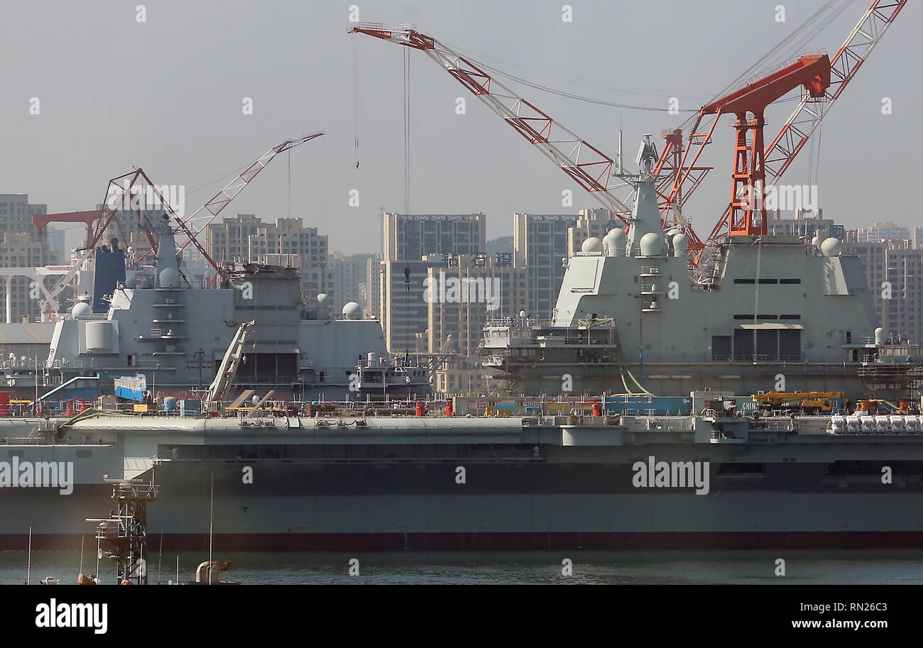Dalian, Liaoning, China. 19th July, 2018. China's two aircraft carriers ...