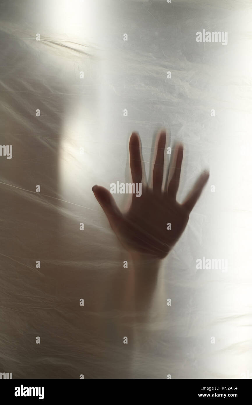 Human hand behind curtain hi-res stock photography and images - Alamy