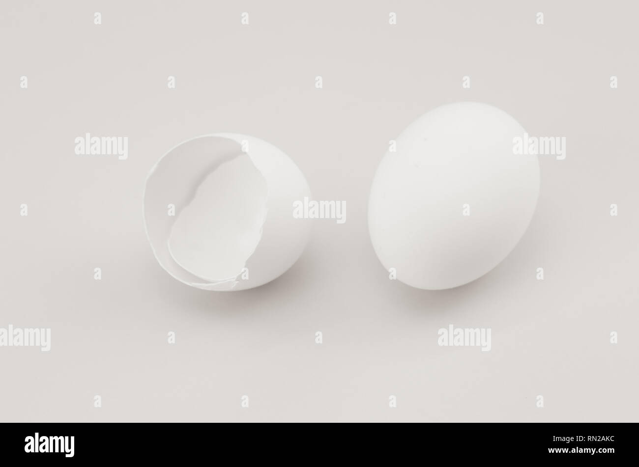 white empty broken egg shell on a pastel colored surface Stock Photo ...