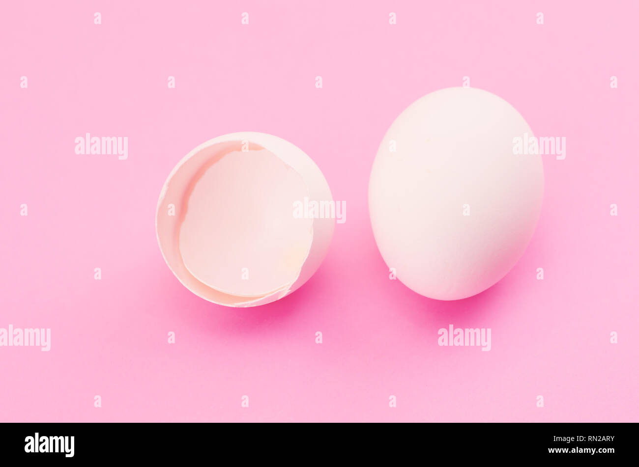 white empty broken egg shell on a pastel colored surface Stock Photo ...