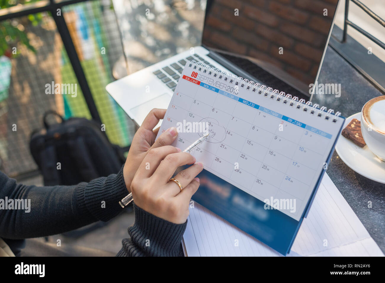 Arranging calendar hi-res stock photography and images - Alamy