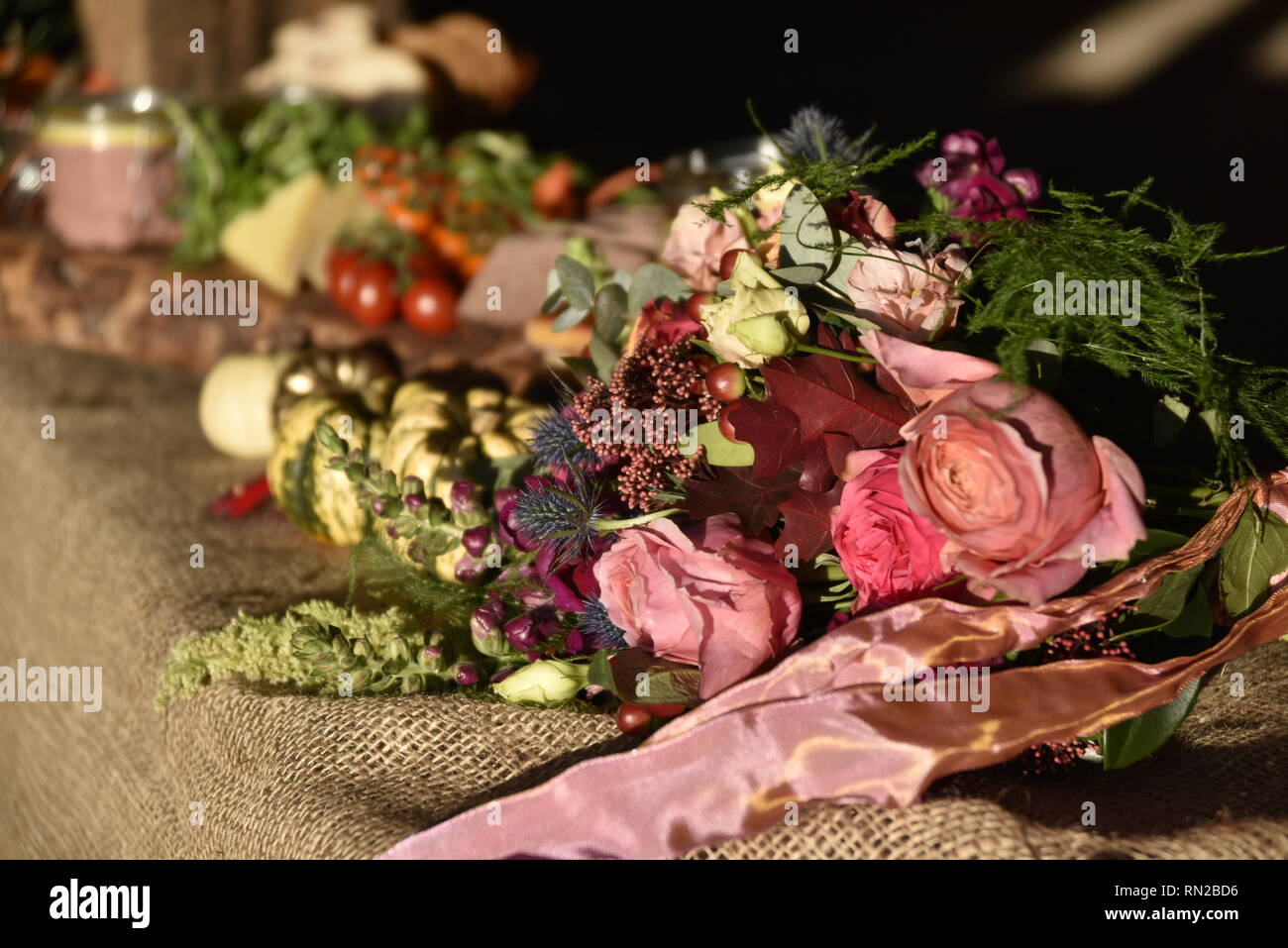 Beautiful vibrant cut flowers in a display in a strong low natural ...
