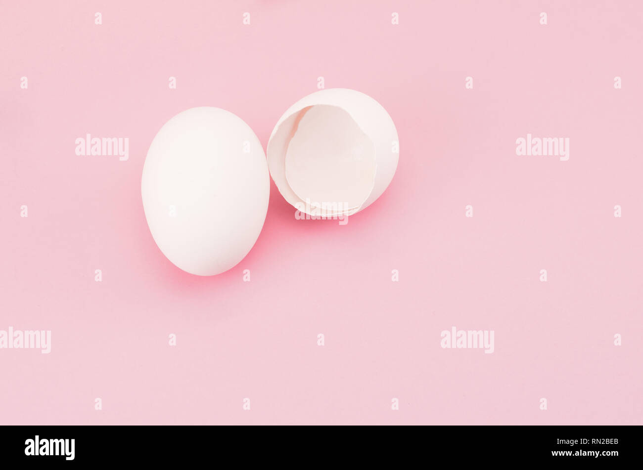 white empty broken egg shell on a pastel colored surface Stock Photo ...