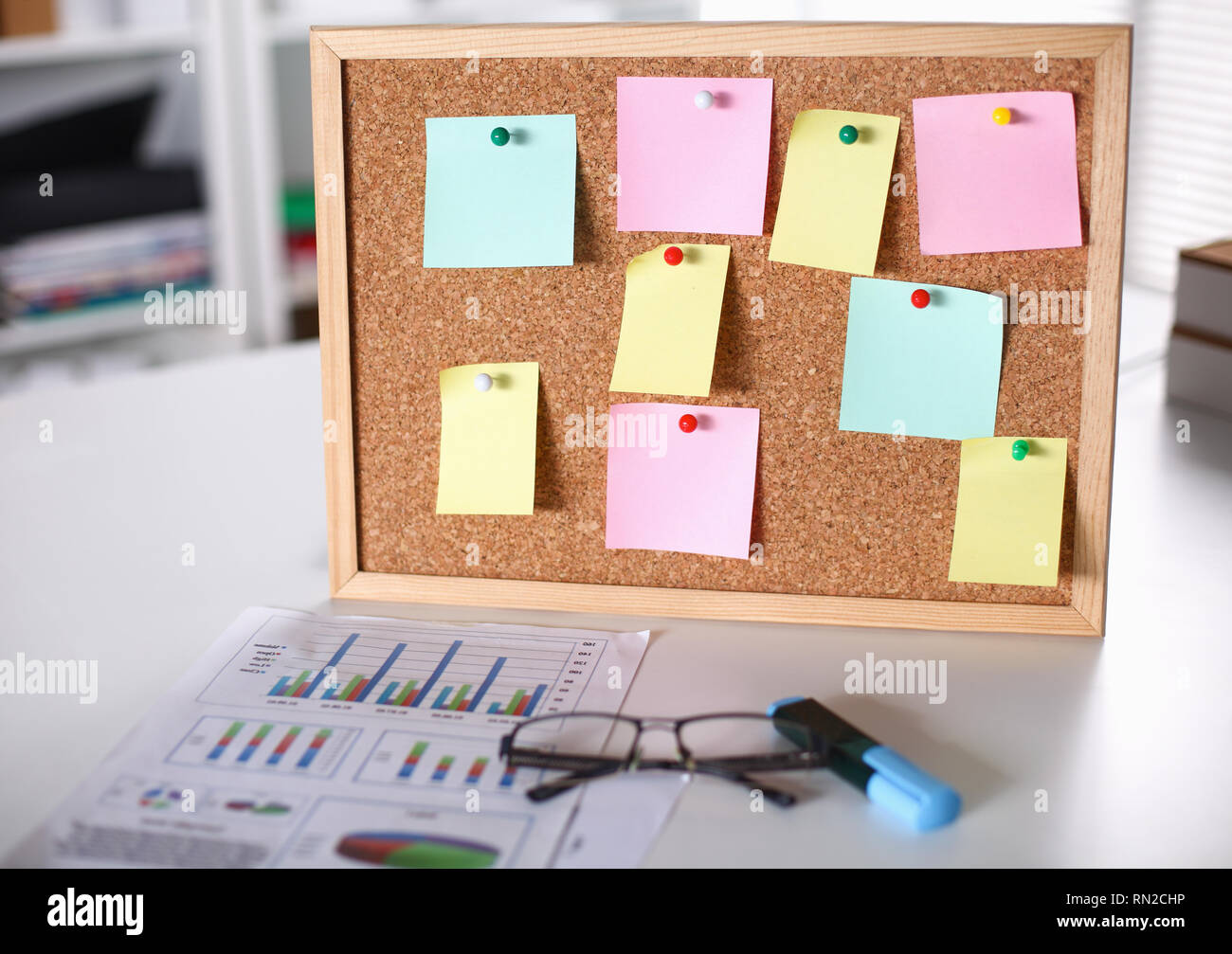multicolored stickers on the board in the office Stock Photo - Alamy