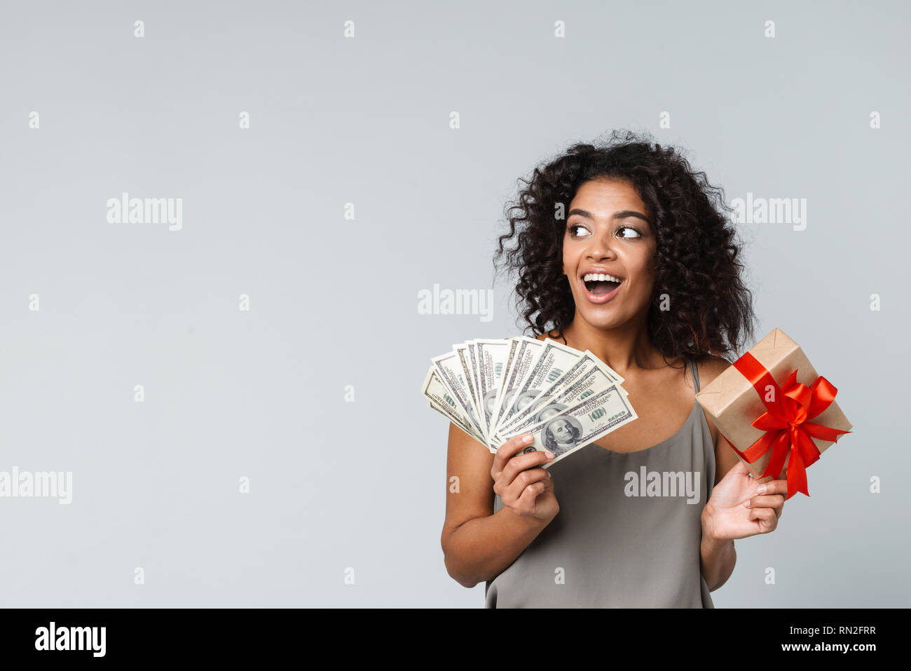African female hand holding banknote hi-res stock photography and ...