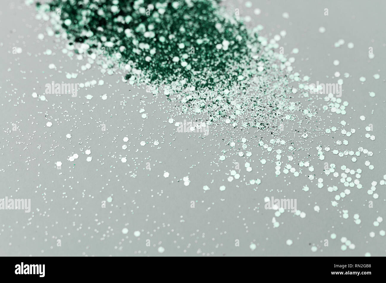 Color glitter on light background - macro photo Stock Photo - Alamy