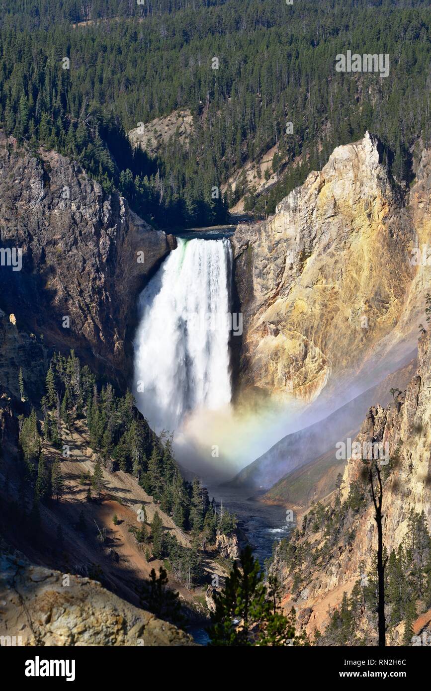 Beautiful view of the Grand Yellowstone Fall with rainbow at the bottom ...