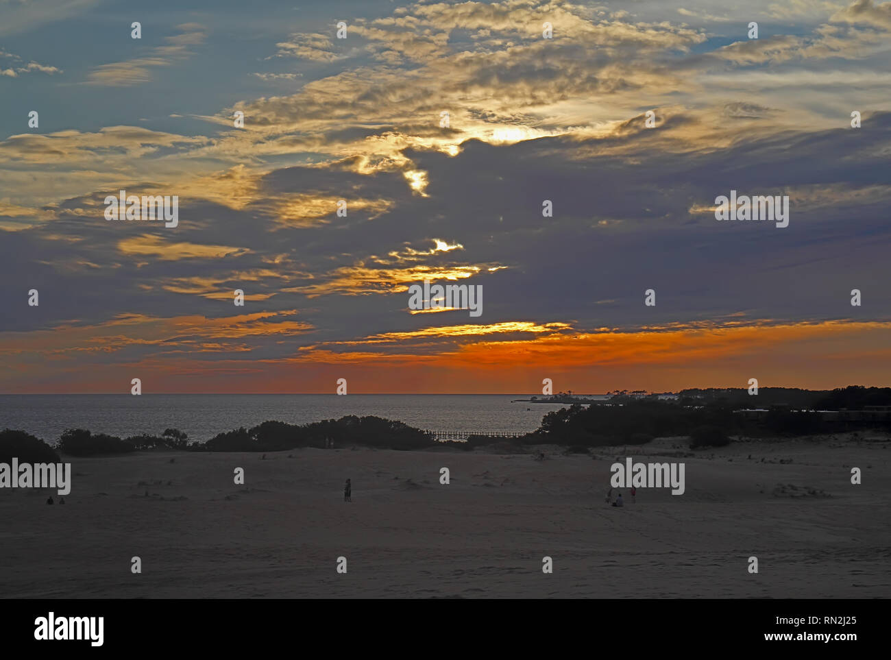 Sunset over Albemarle Sound as viewed by unidentifiable people from ...