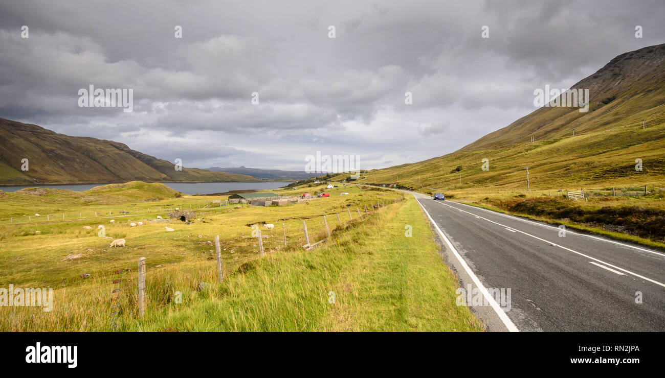 The A87 main road runs through farmland in a valley floor at Sconser ...