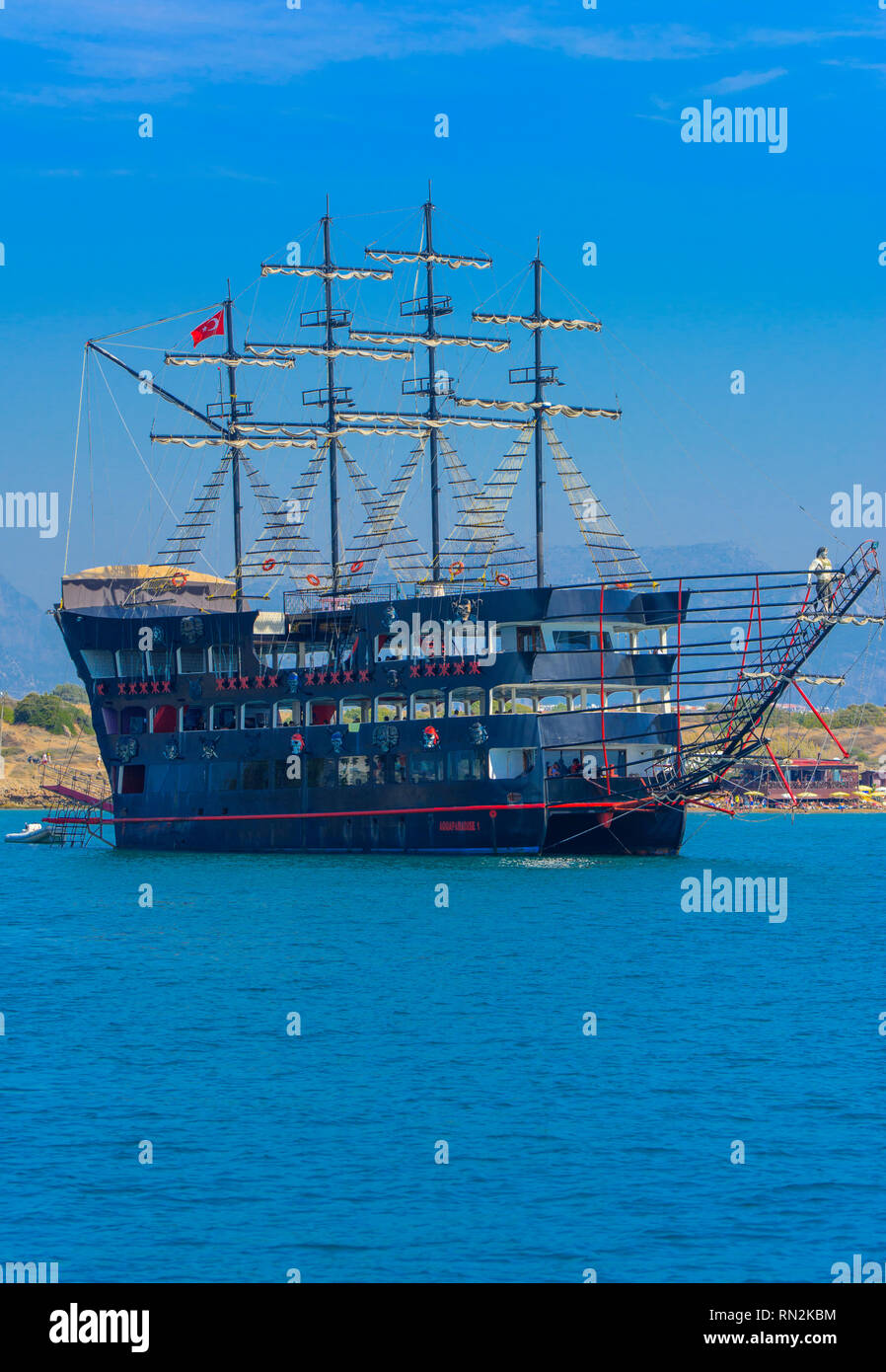 Alanya, Turkey - October 05, 2018. A large dark sailing ship in a ...
