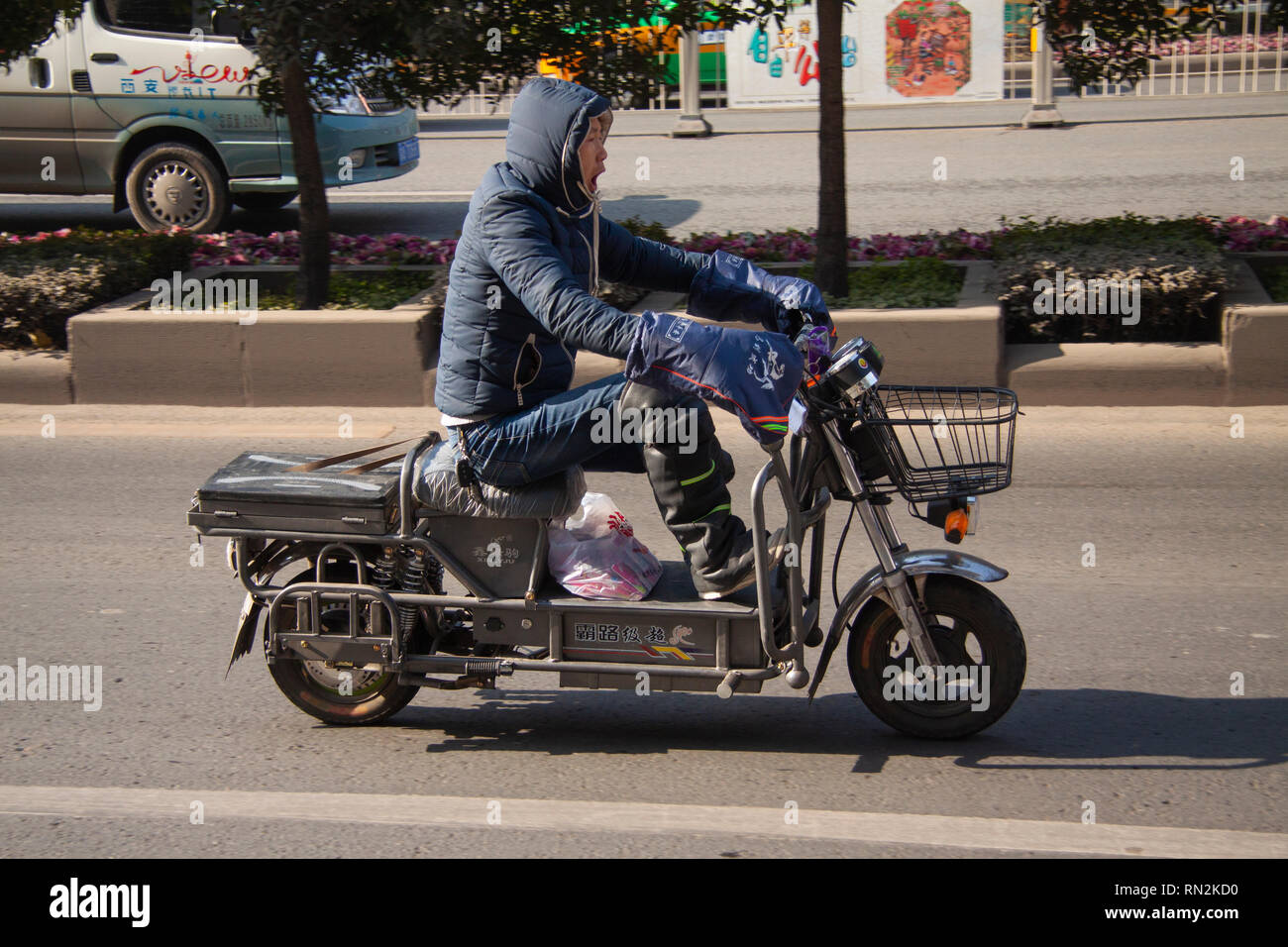 Riding a moped hi-res stock photography and images - Alamy