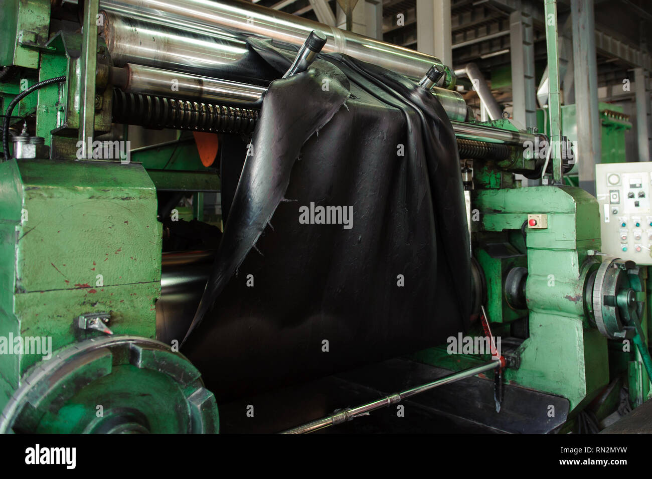 A Powerful Press for the Creation of Rubber Products from Rubber Stock ...