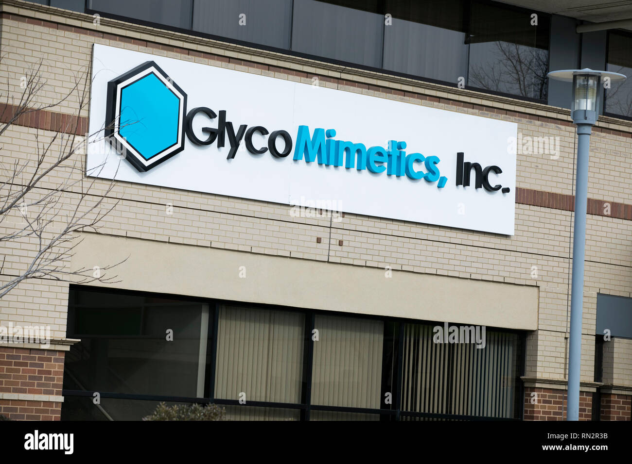 A logo sign outside of the headquarters of GlycoMimetics in Rockville ...