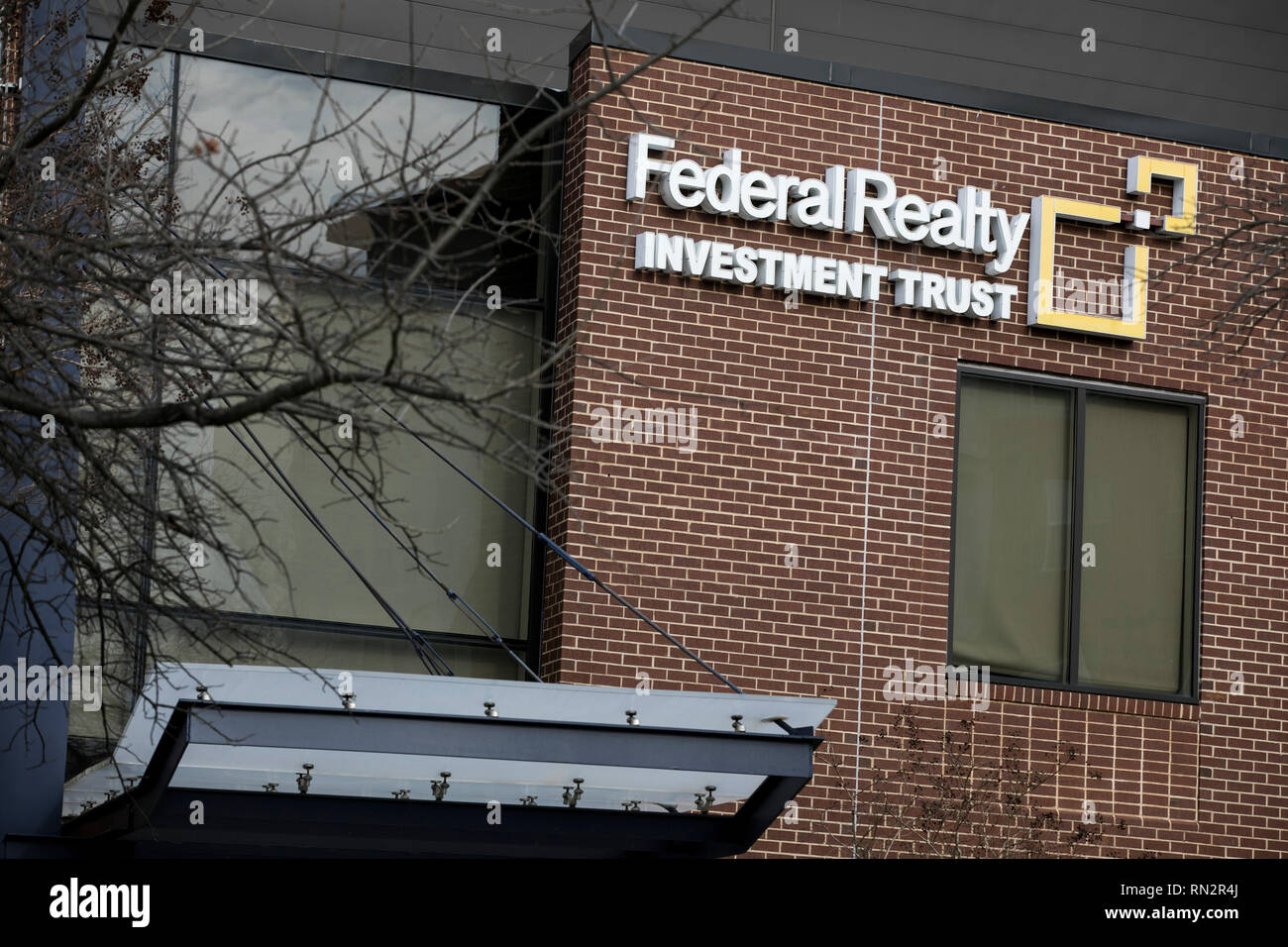 A logo sign outside of the headquarters of Federal Realty Investment ...