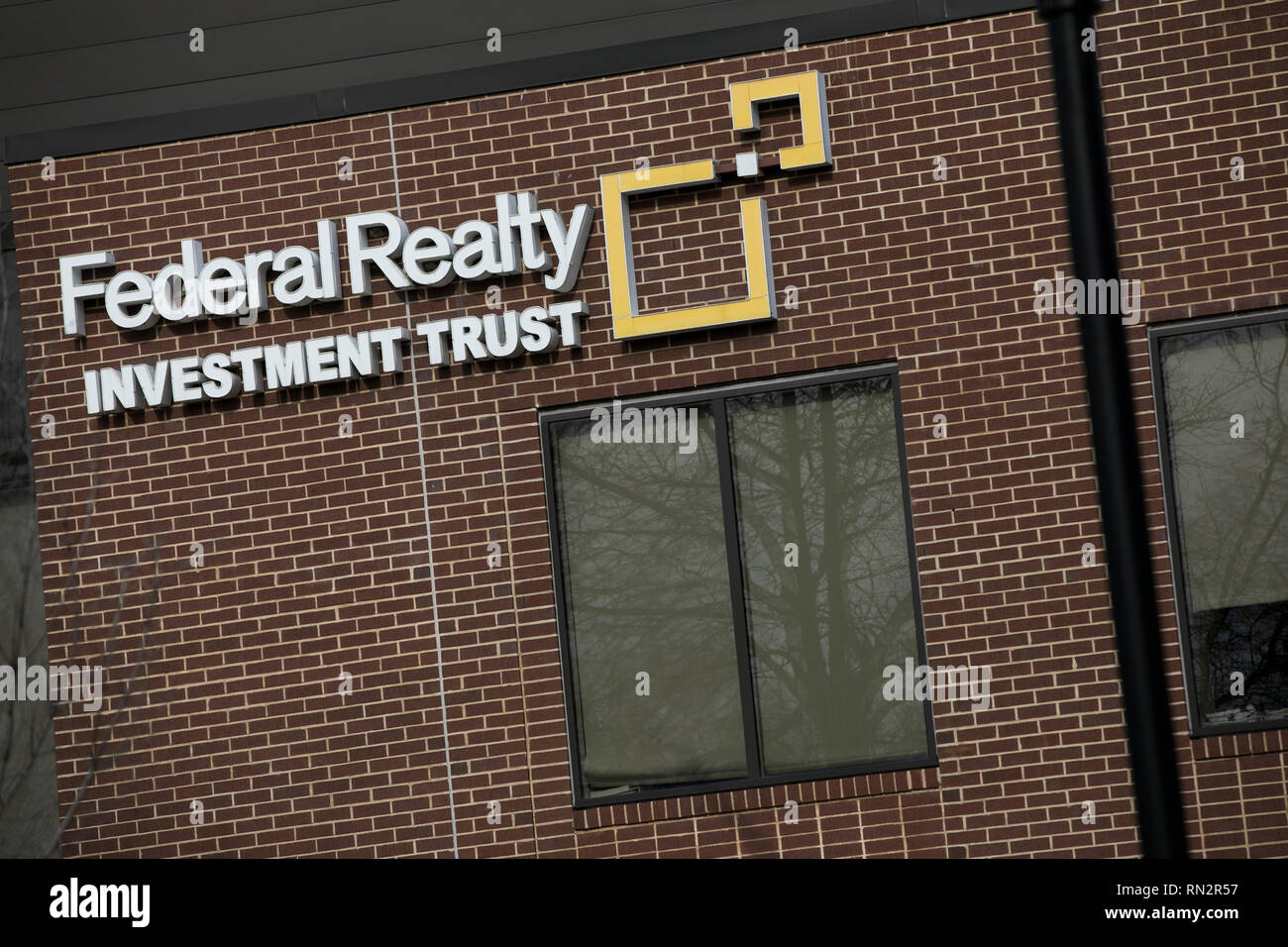 A logo sign outside of the headquarters of Federal Realty Investment ...