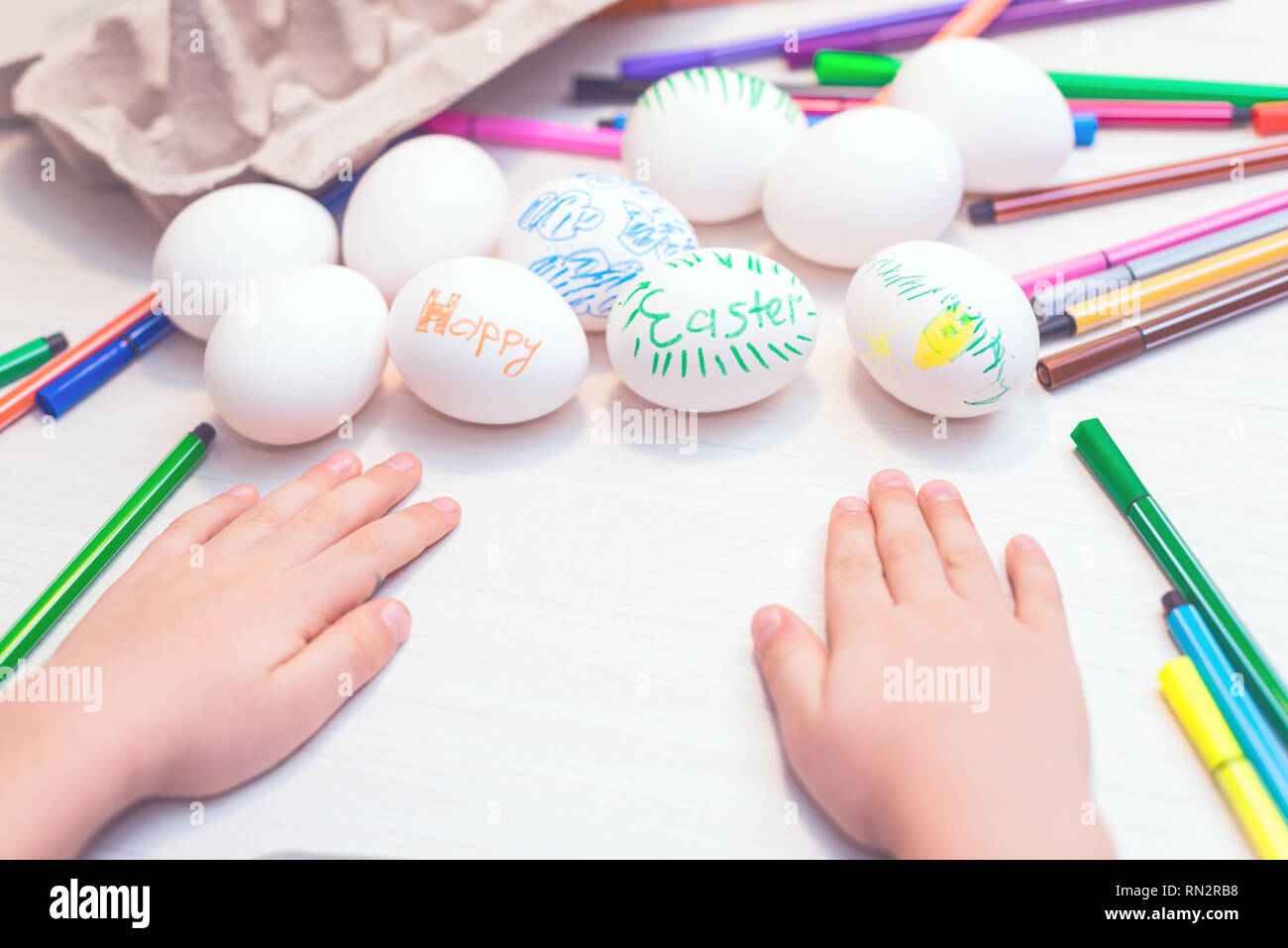 Easter eggs painted by child by hand Stock Photo - Alamy