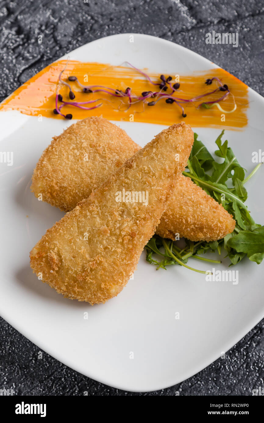 tasty fresh fried breaded cheese on white palte Stock Photo - Alamy