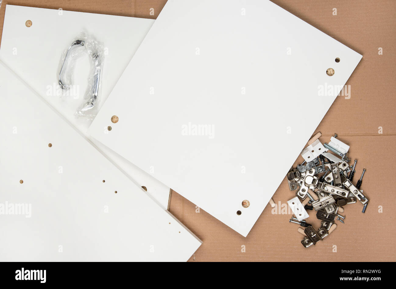 Handyman is assembling a cabinet. Furniture put together concept Stock ...