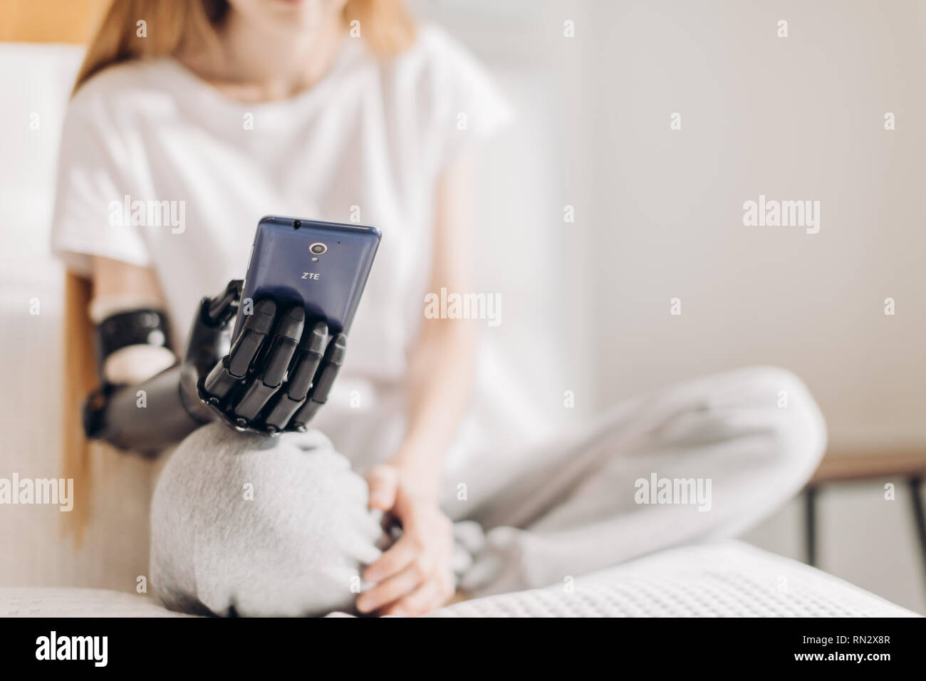 girl has artificial device instead of a real one and browsing the net ...