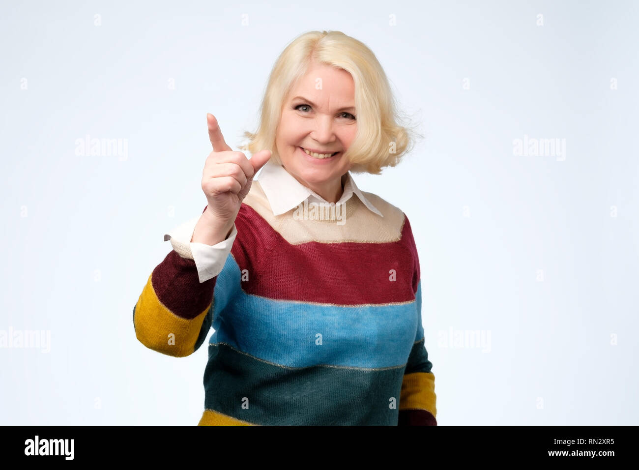 Old age woman pointing finger hi-res stock photography and images - Alamy