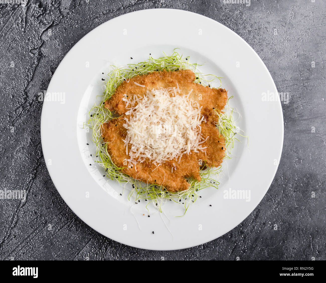 tasty delicious fried chicken schnitzel in restaurant setting Stock ...