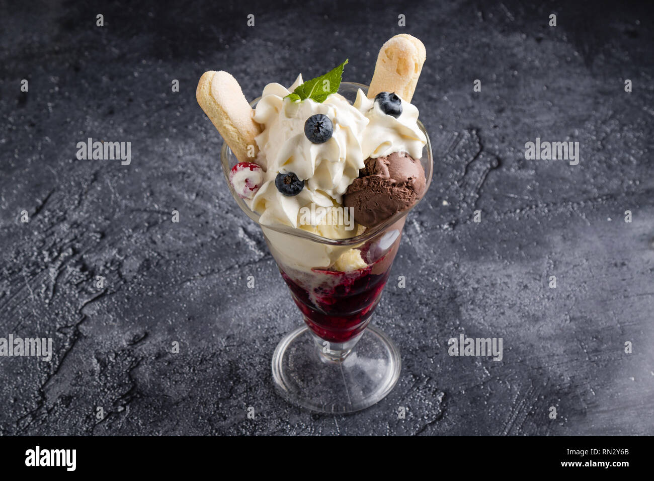 fresh sweet refreshing ice cream sundae in glass Stock Photo - Alamy