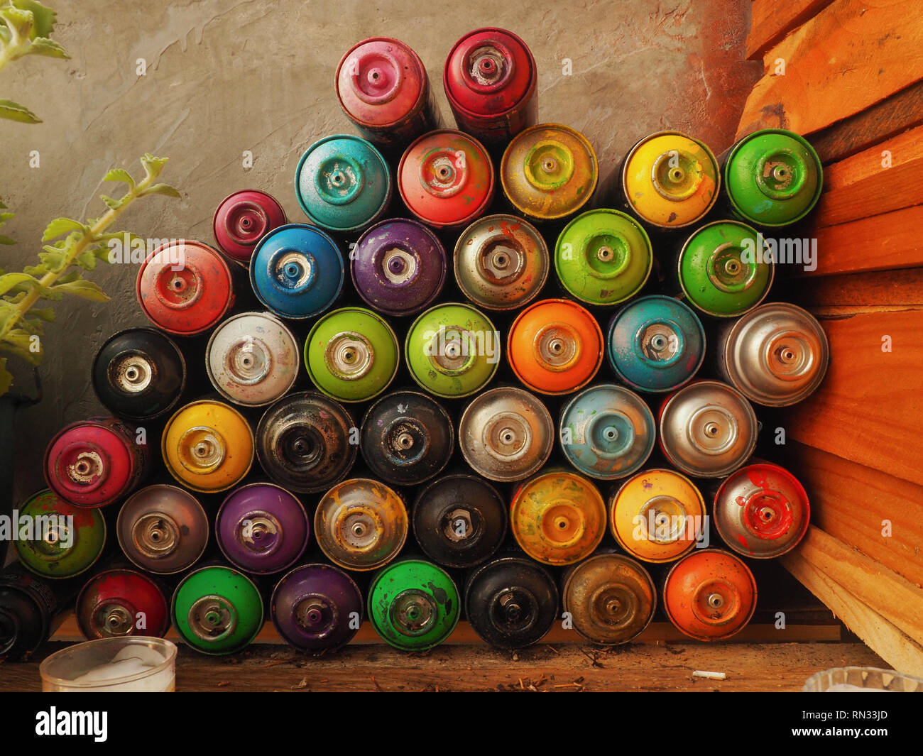 Composition of colored spray cans Stock Photo - Alamy