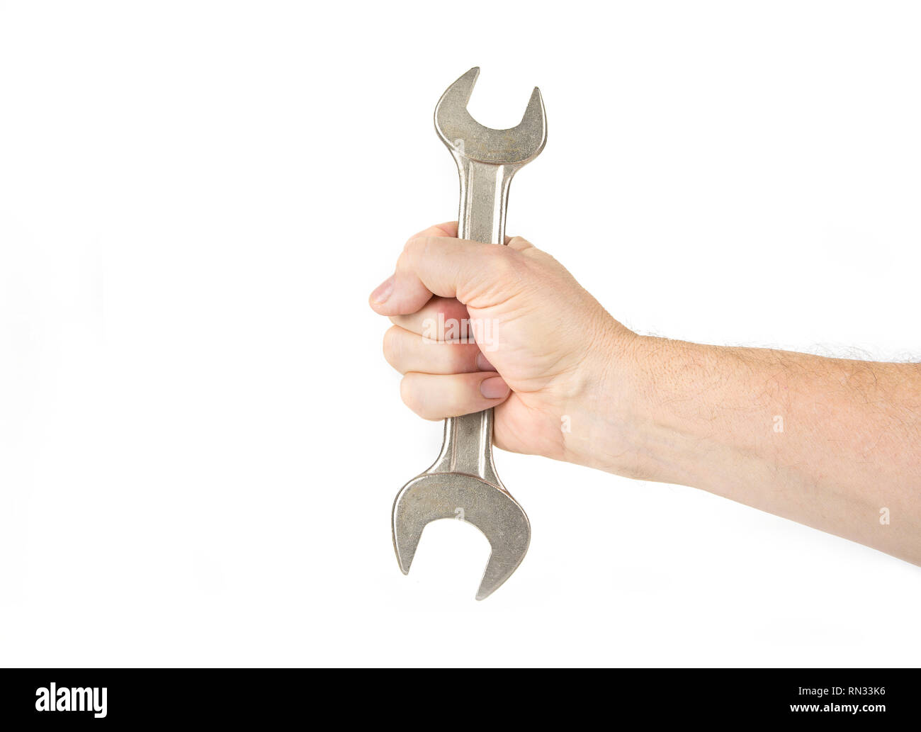 Wrench in the hand. Service concept Stock Photo - Alamy