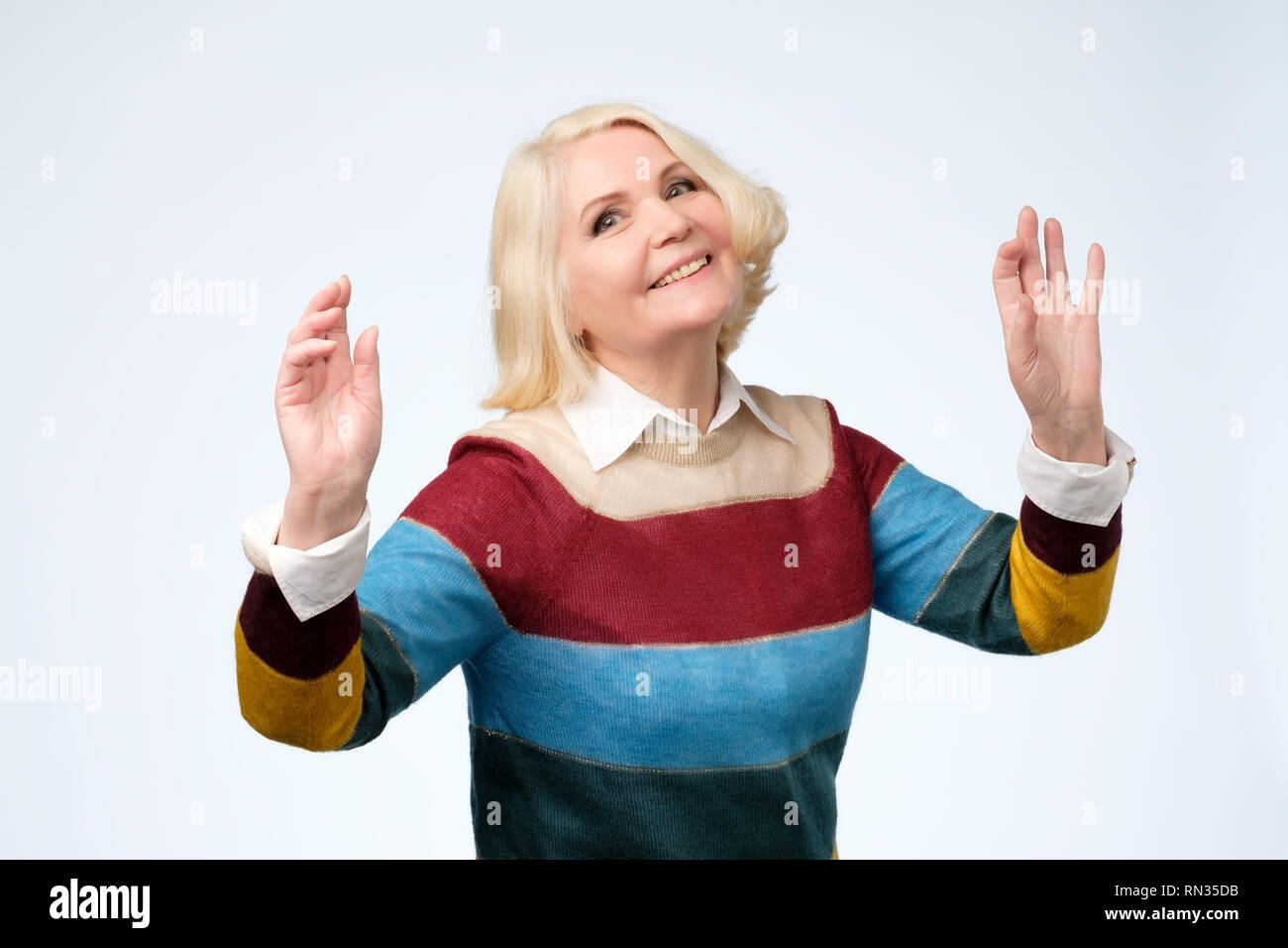 Old woman dancing hi-res stock photography and images - Alamy