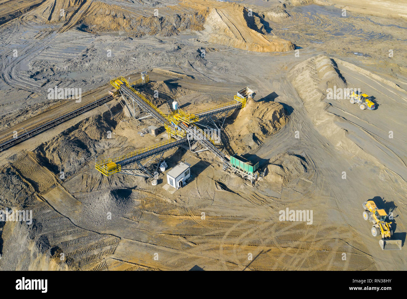 Aerial view of sandpit and factory plant producing sand materials for ...