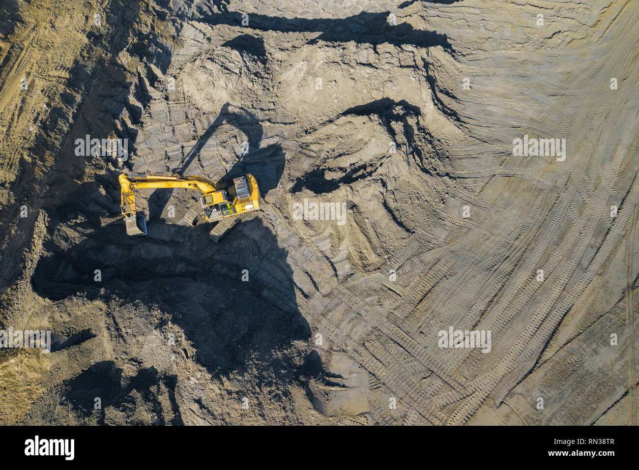 Aerial view of excavator and construction equipment. Machinery and mine ...