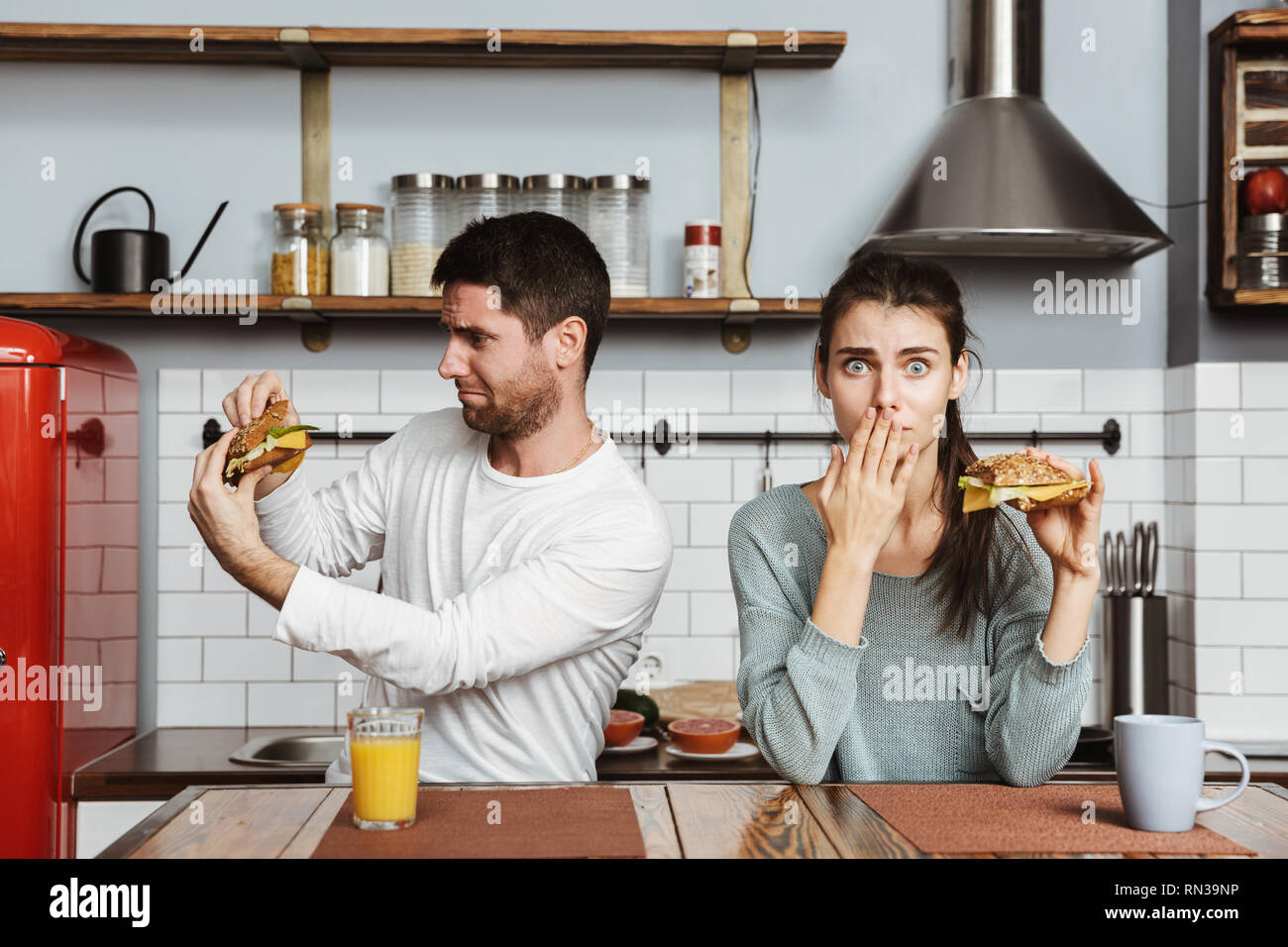 Woman disgusted and husband hi-res stock photography and images - Alamy