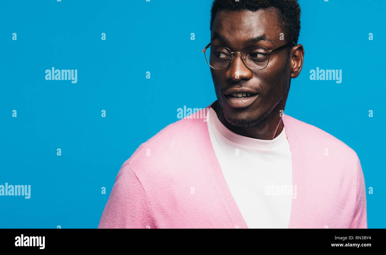 Smart young african man looking away at copy space. Good looking ...