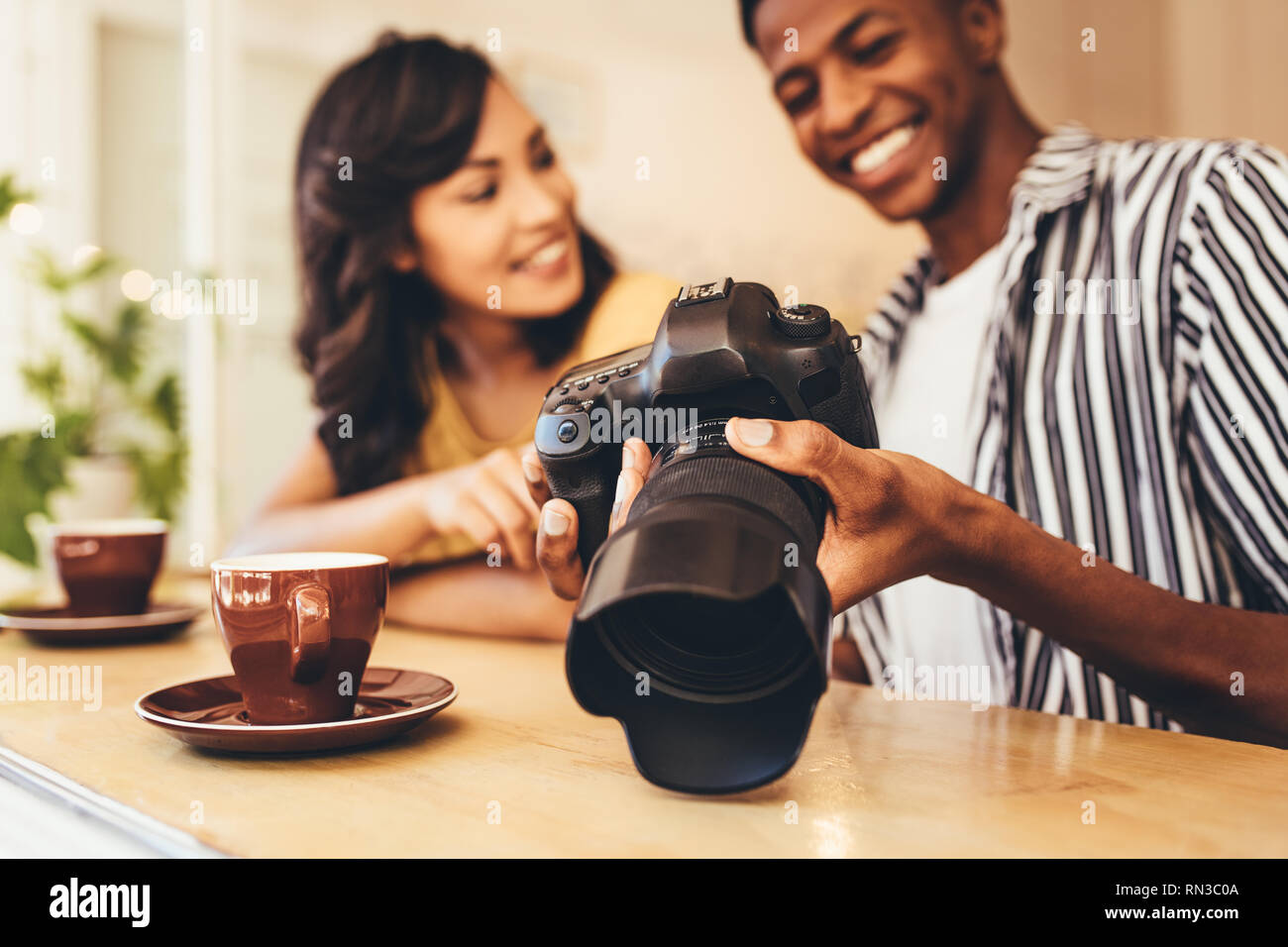 Showing Pictures To Friend High Resolution Stock Photography and Images ...