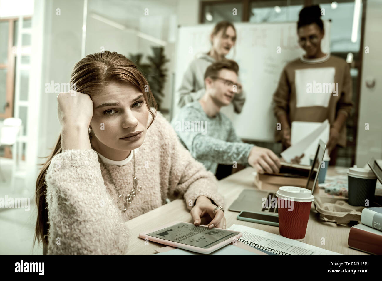 Young trainee of the office feeling extremely bored and tired Stock ...