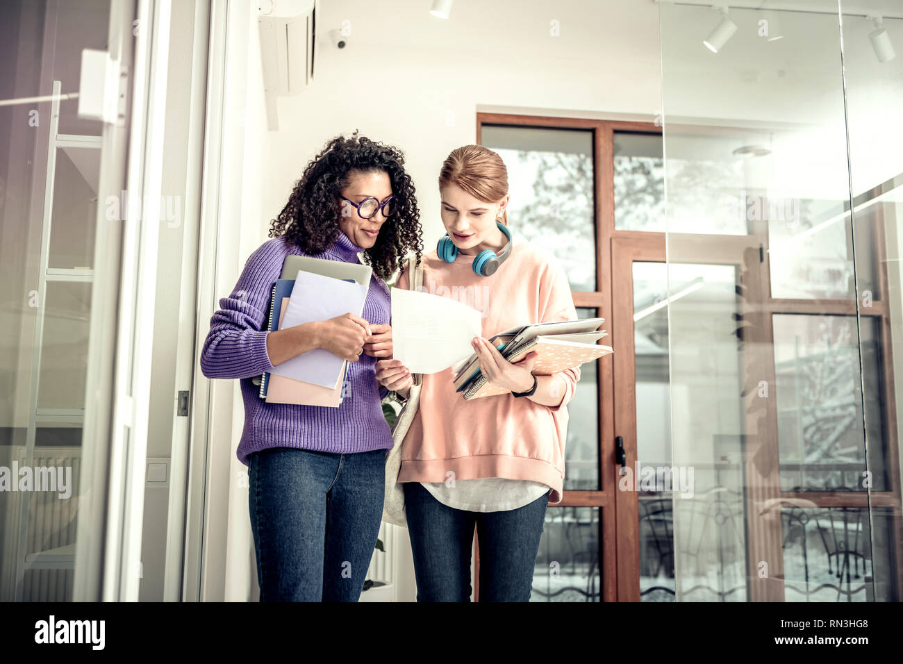Two smart students preparing to important test together Stock Photo - Alamy