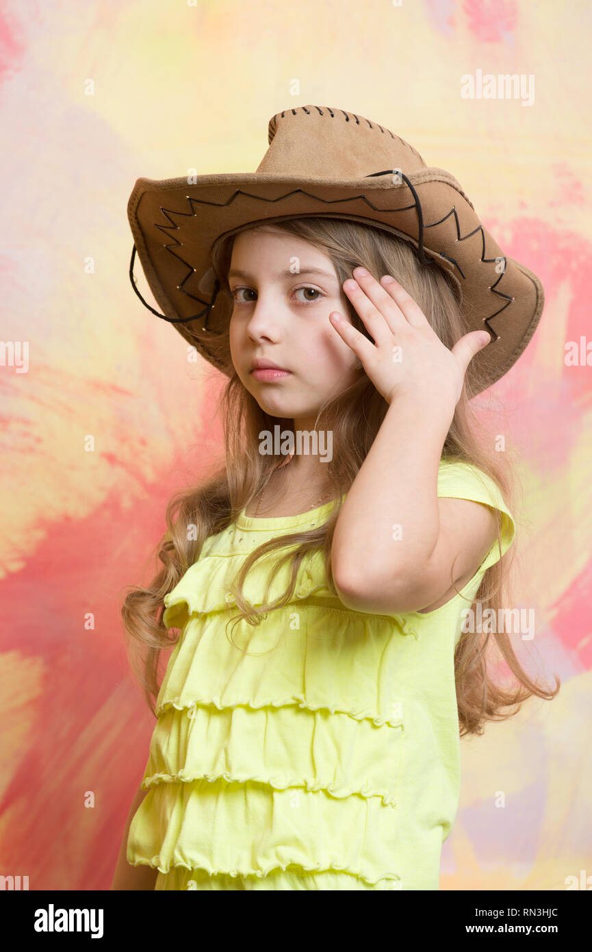 adorable little girl with cute face in american western cowboy hat on ...