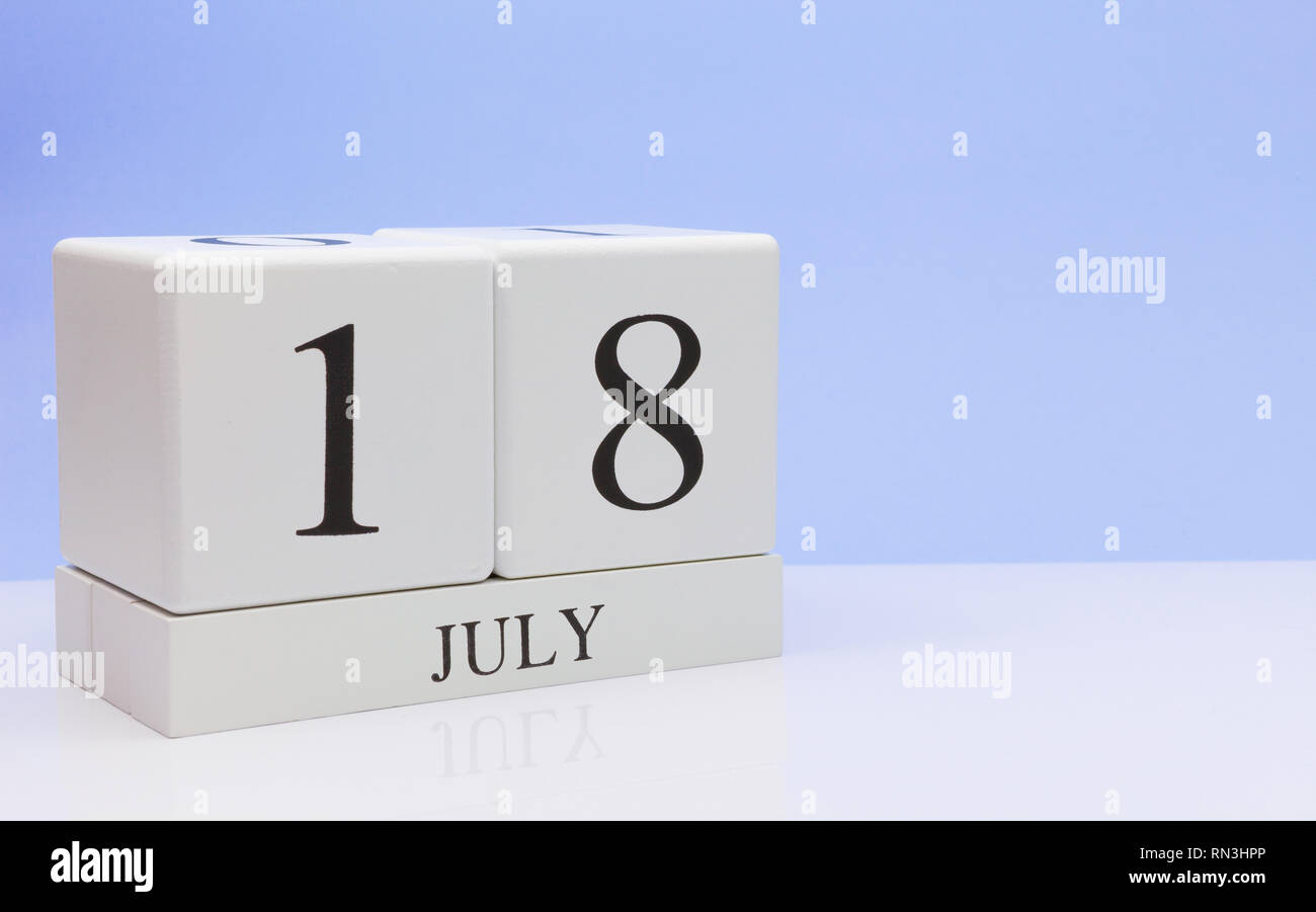 July 18st. Day 18 of month, daily calendar on white table with ...