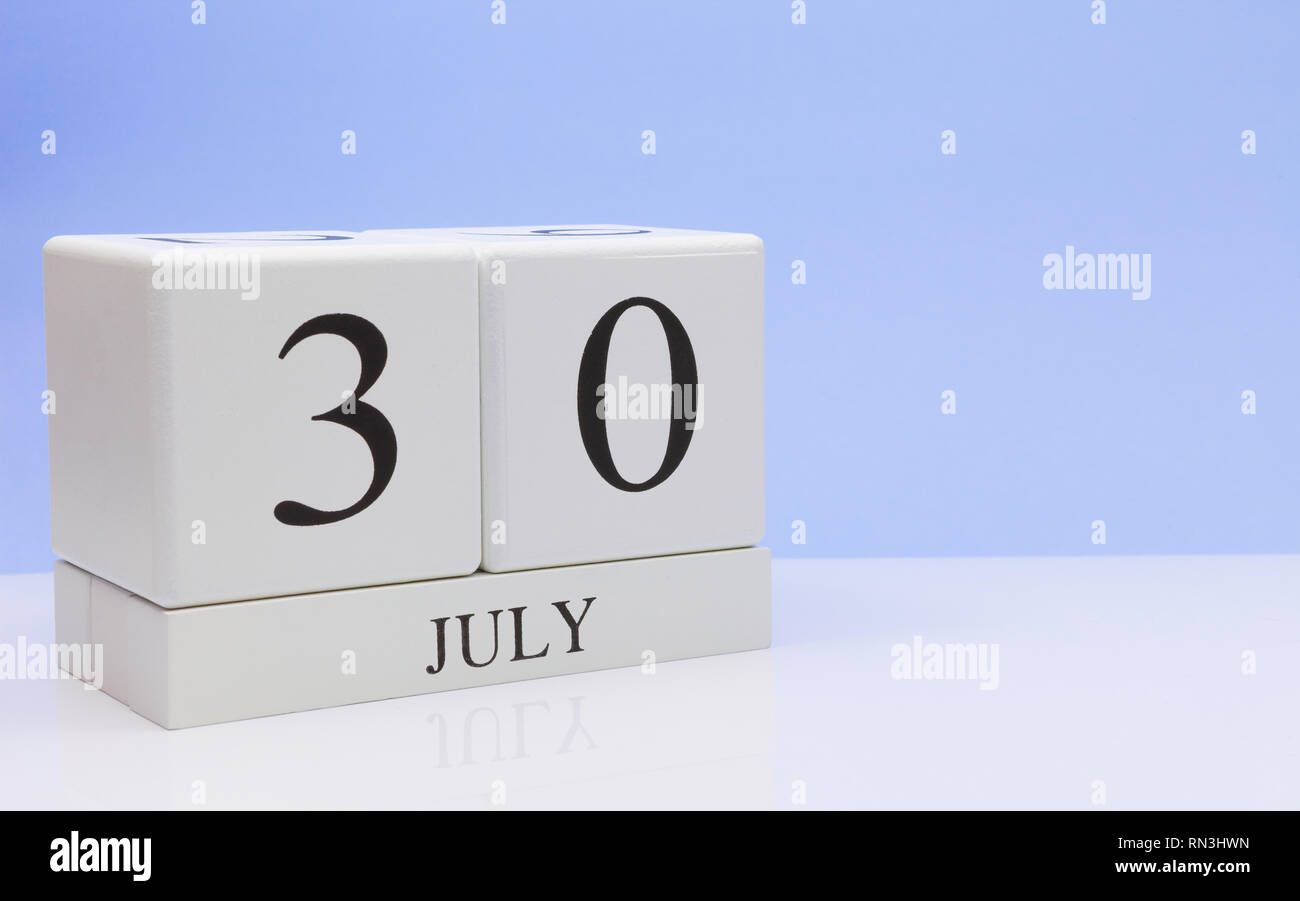 July 30st. Day 30 of month, daily calendar on white table with ...