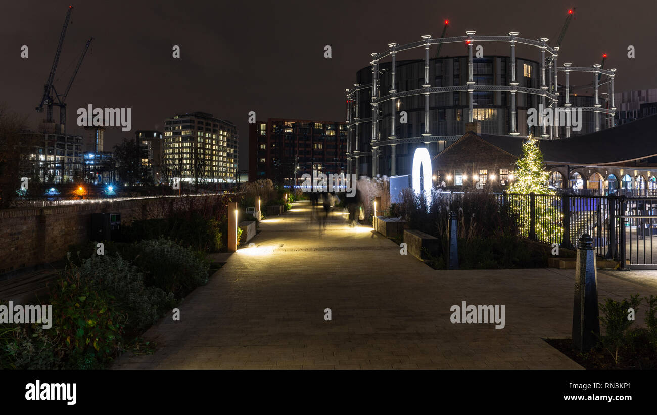 London, England, UK - December 14, 2018: Pedestrians walk along Bagley ...