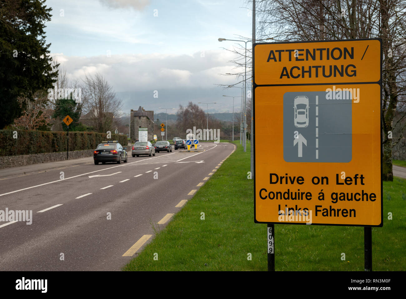 Cars driving on the left side of the road hi-res stock photography and ...