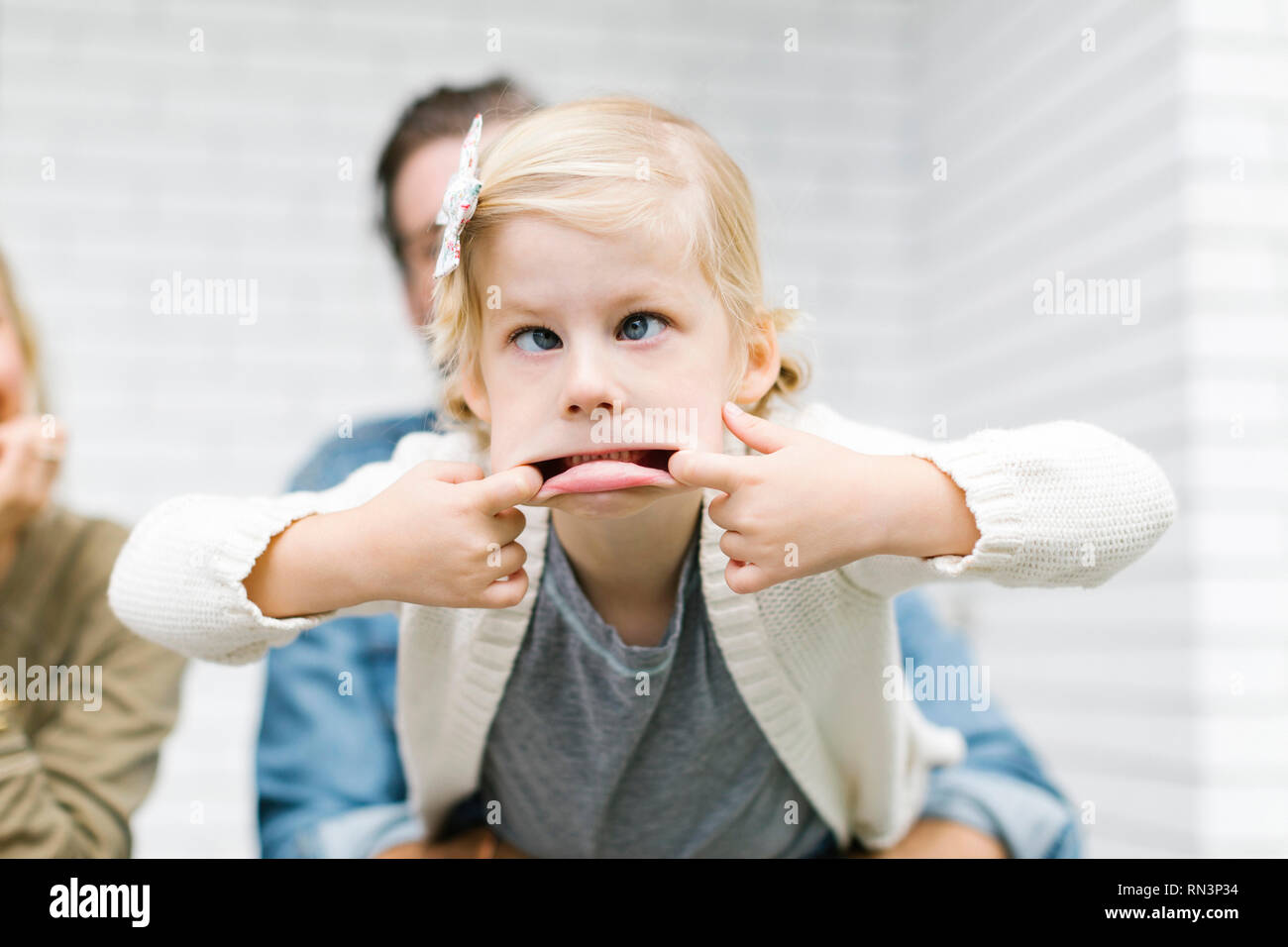 Girl making a face Stock Photo - Alamy